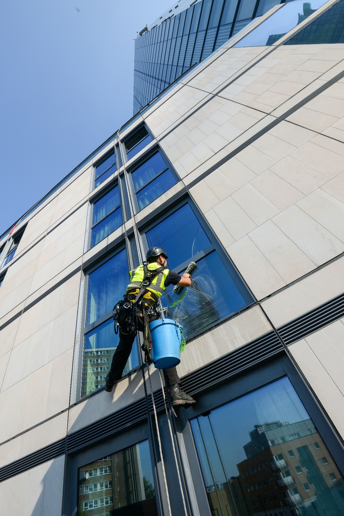 High Rise Window Cleaning: What To Know About Abseiling - Aquamark